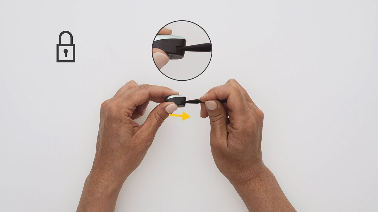 Open the tamper-resistant battery door on your Cochlear™ Baha® 6 Max or ...