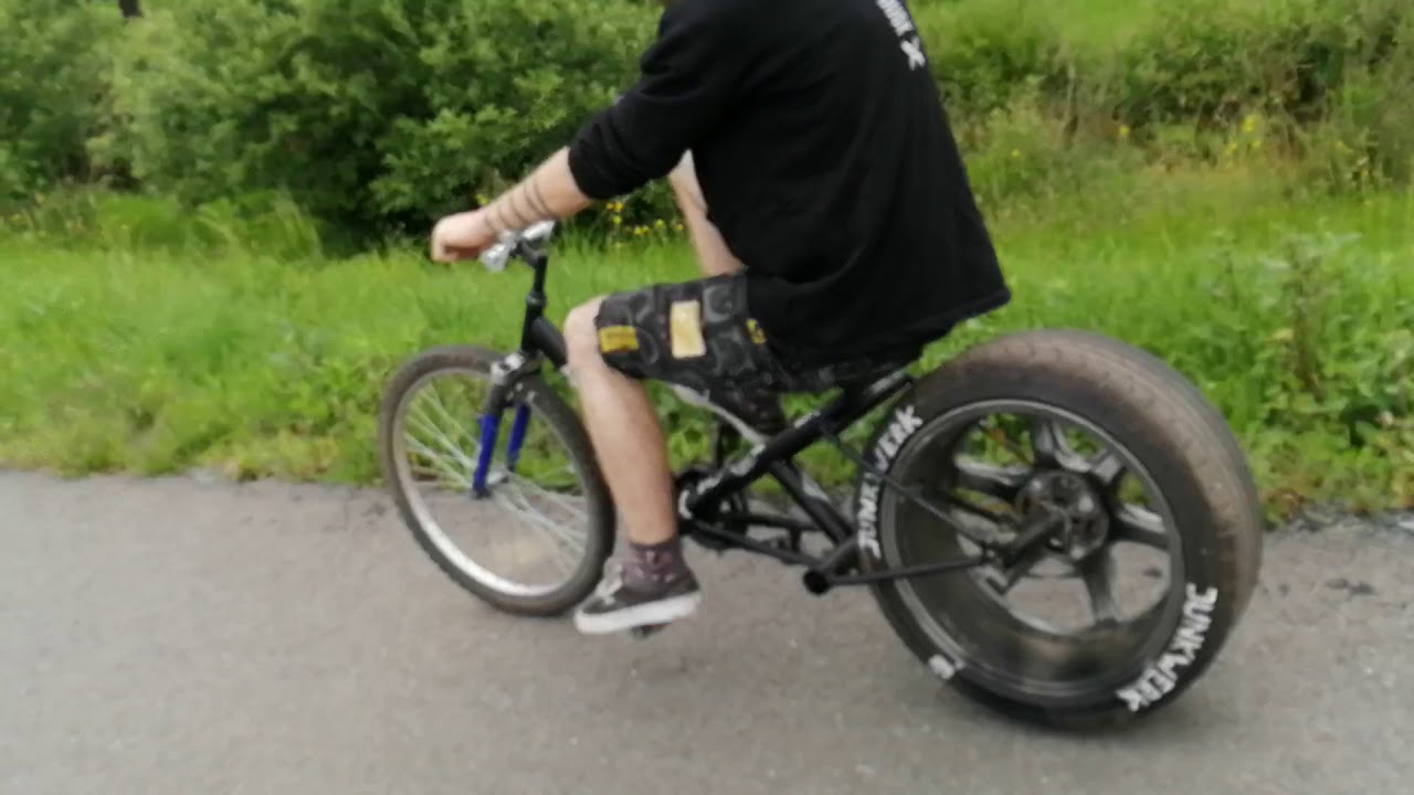 Bicycle with car wheel - YouTube