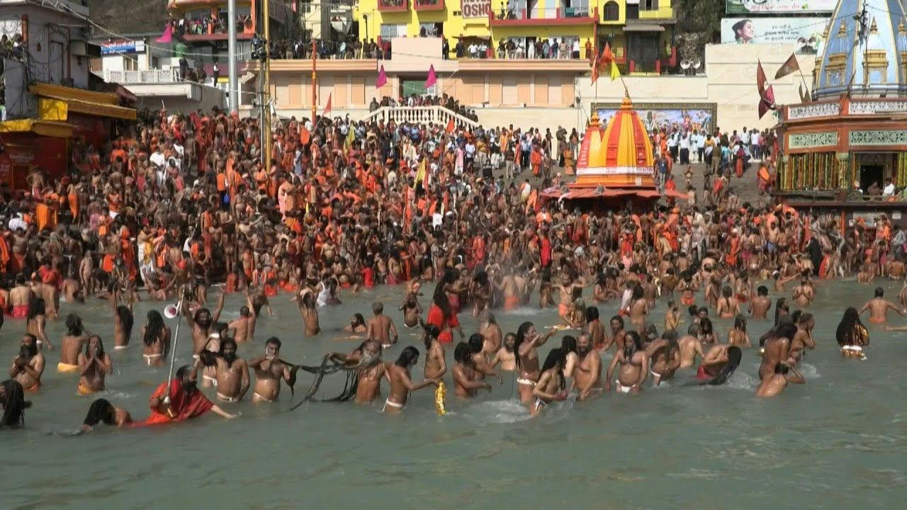 Jubilant Hindu pilgrims take holy dip in India's Ganges river | AFP ...