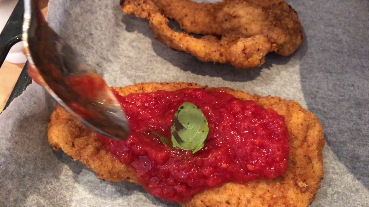 Cotoletta alla parmigiana, Italian schnitzel with tomato and mozzarella ...