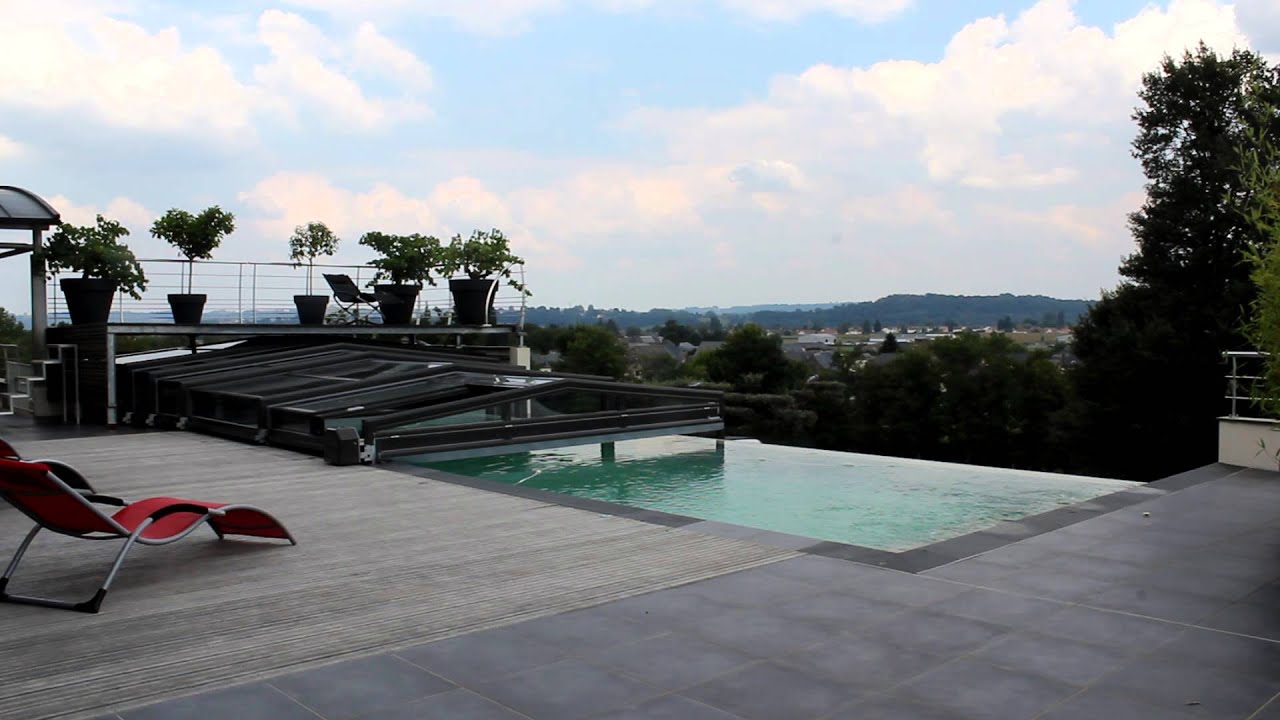 Summit Leisure Motorised Low Enclosure On Infinity Pool - YouTube