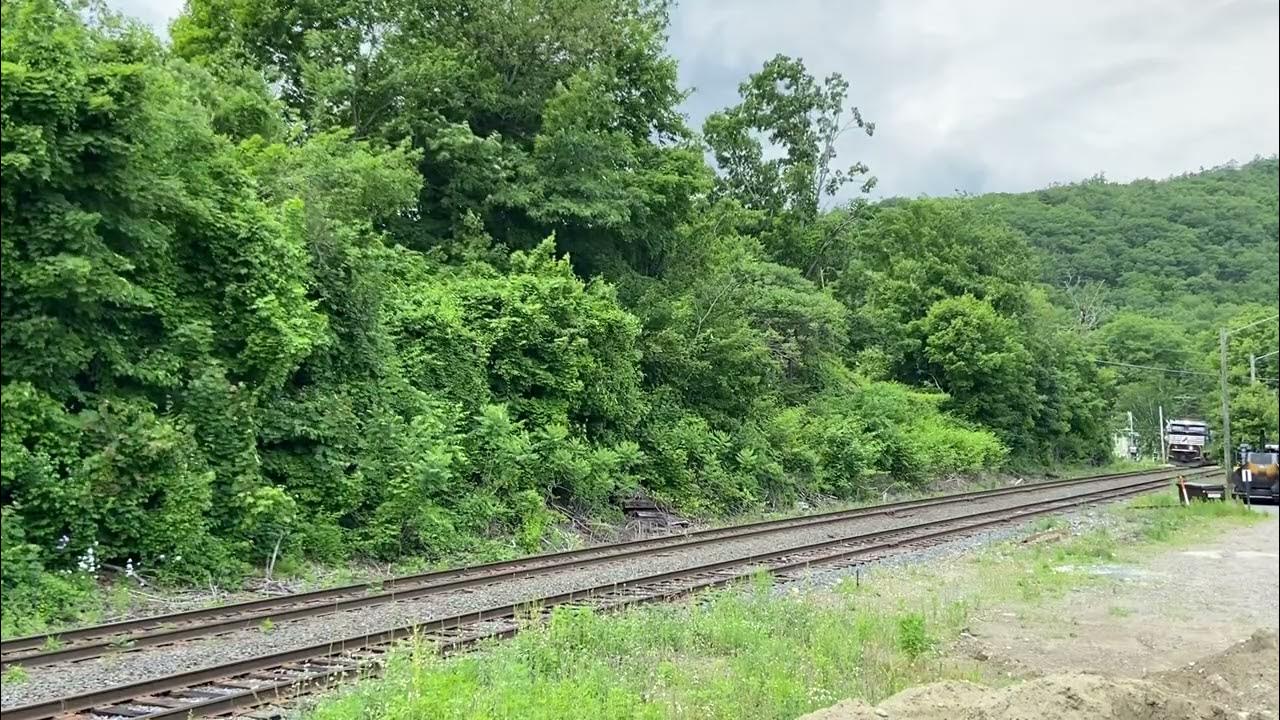 NS #6983 with MEC 7655 leads an NS manifest - YouTube