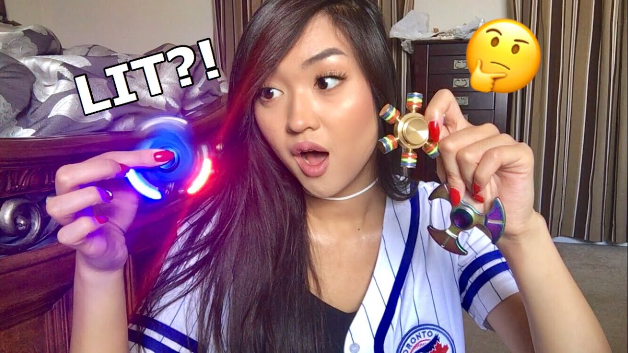 FIRST TIME TRYING FIDGET SPINNERS (Giveaway winners) - YouTube