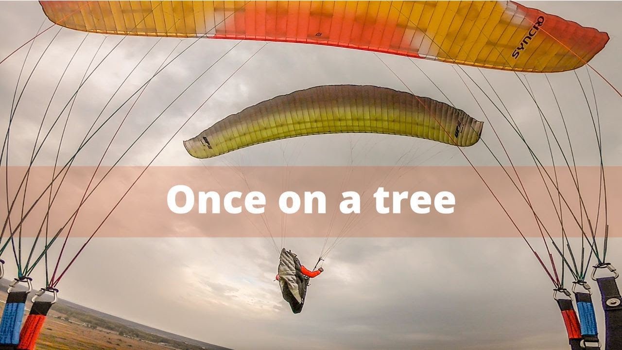 Paraglider hits a tree - YouTube