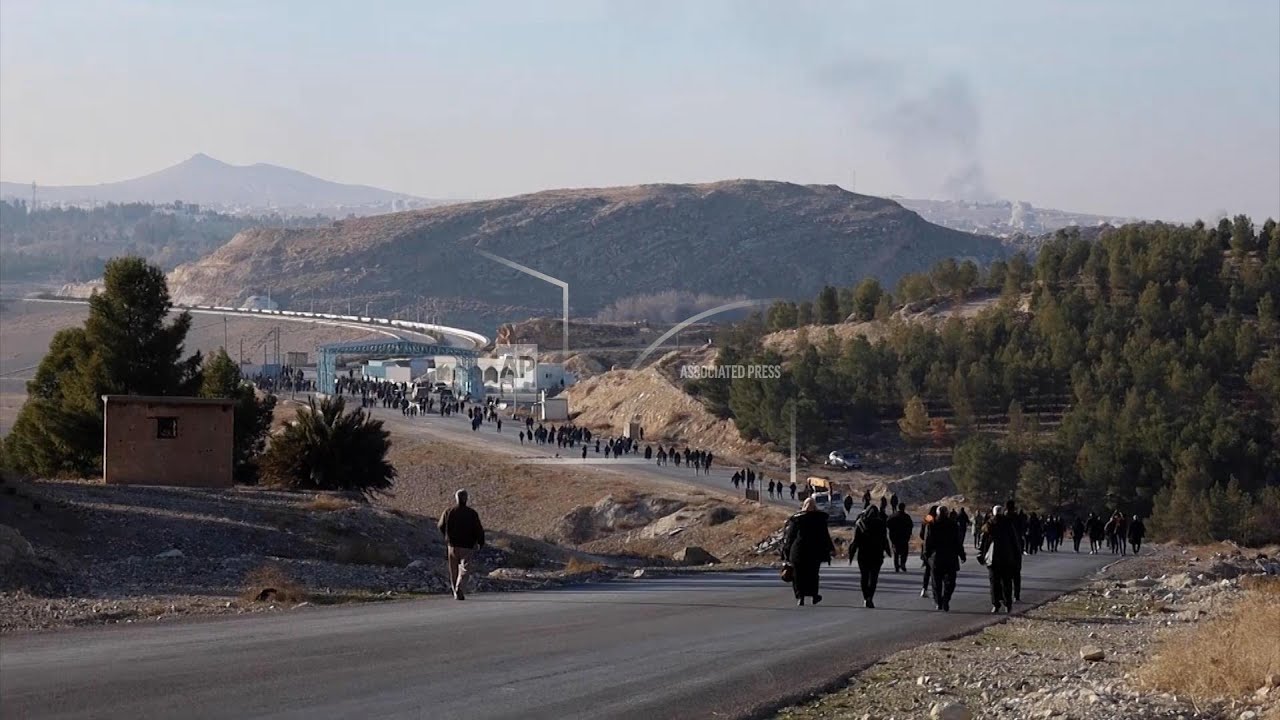 Syrian protest at the Tishreen Dam against ongoing Turkish airstrikes ...