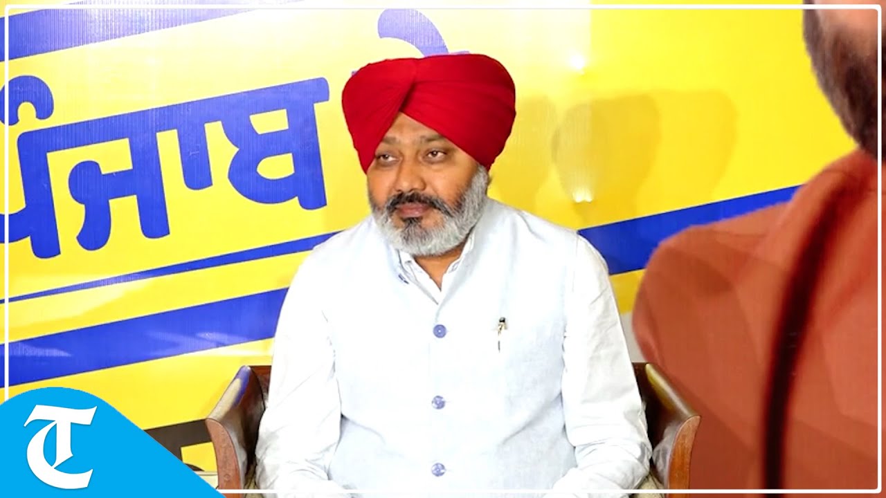 FM Harpal Cheema addresses a press conference as AAP govt completes one ...