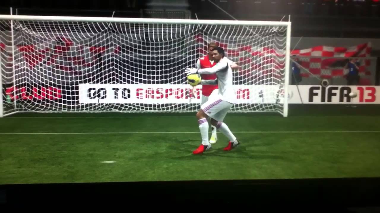 Goalkeeper punches defender - YouTube