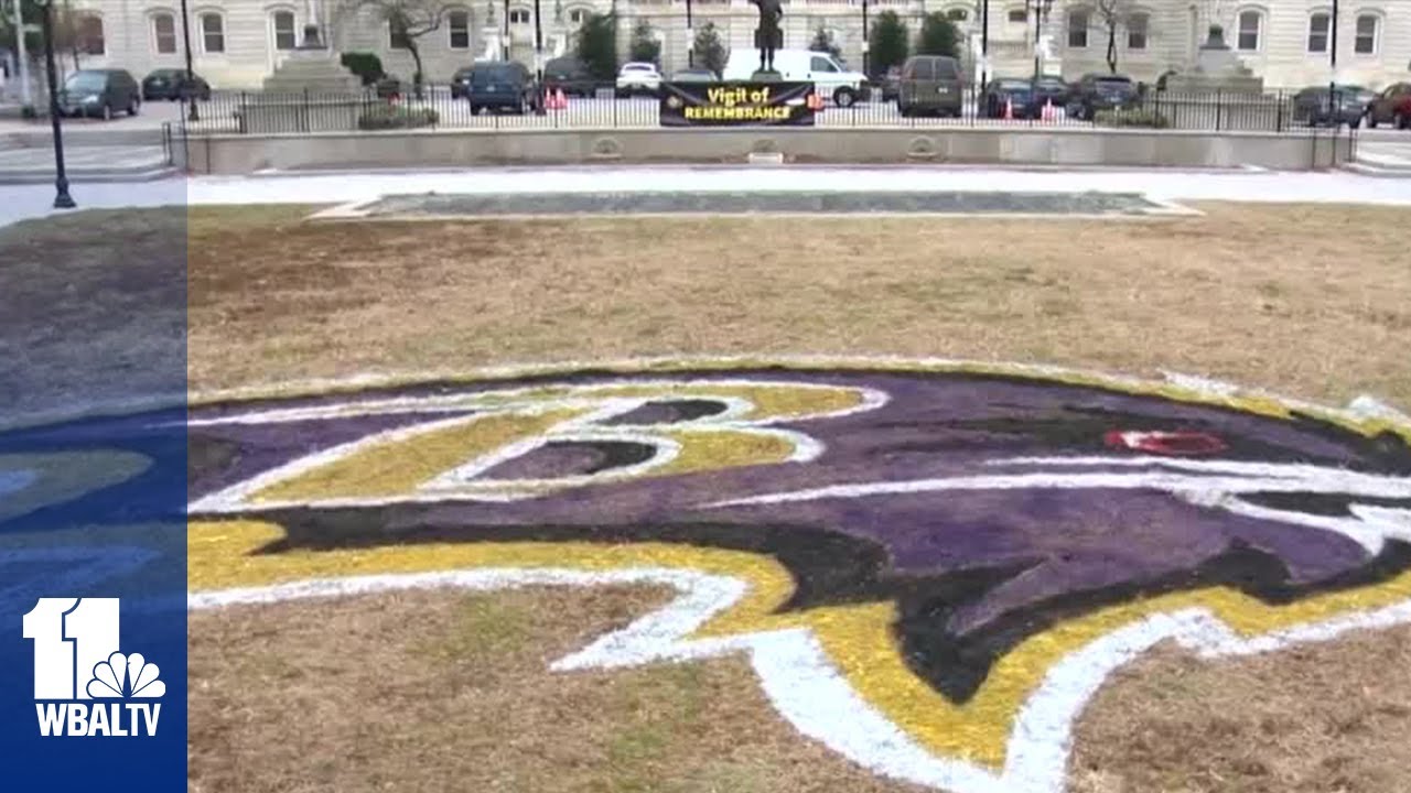 Ravens stencil logo across Baltimore for playoffs - YouTube
