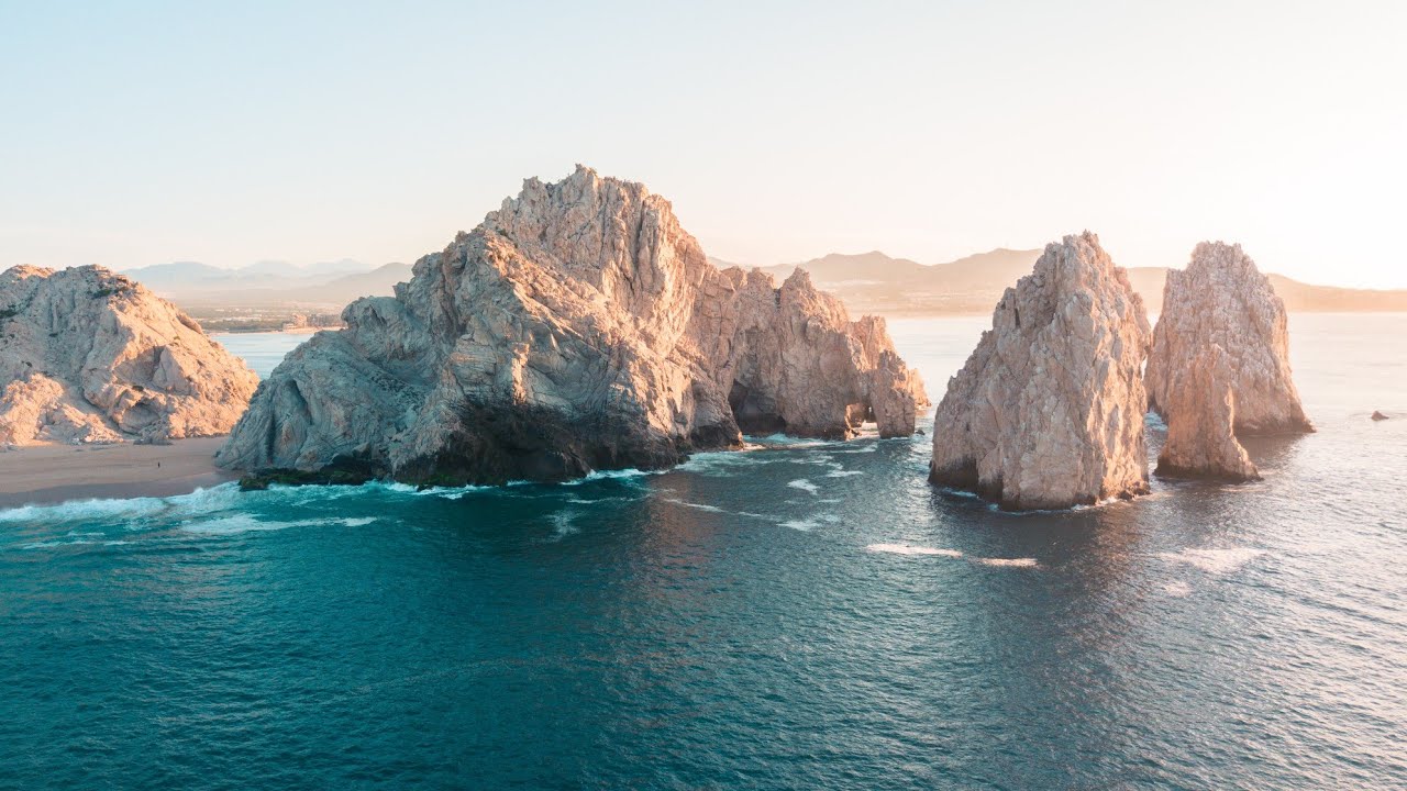 Climbing over Cliffs to get to Secluded Beach in Cabo - YouTube