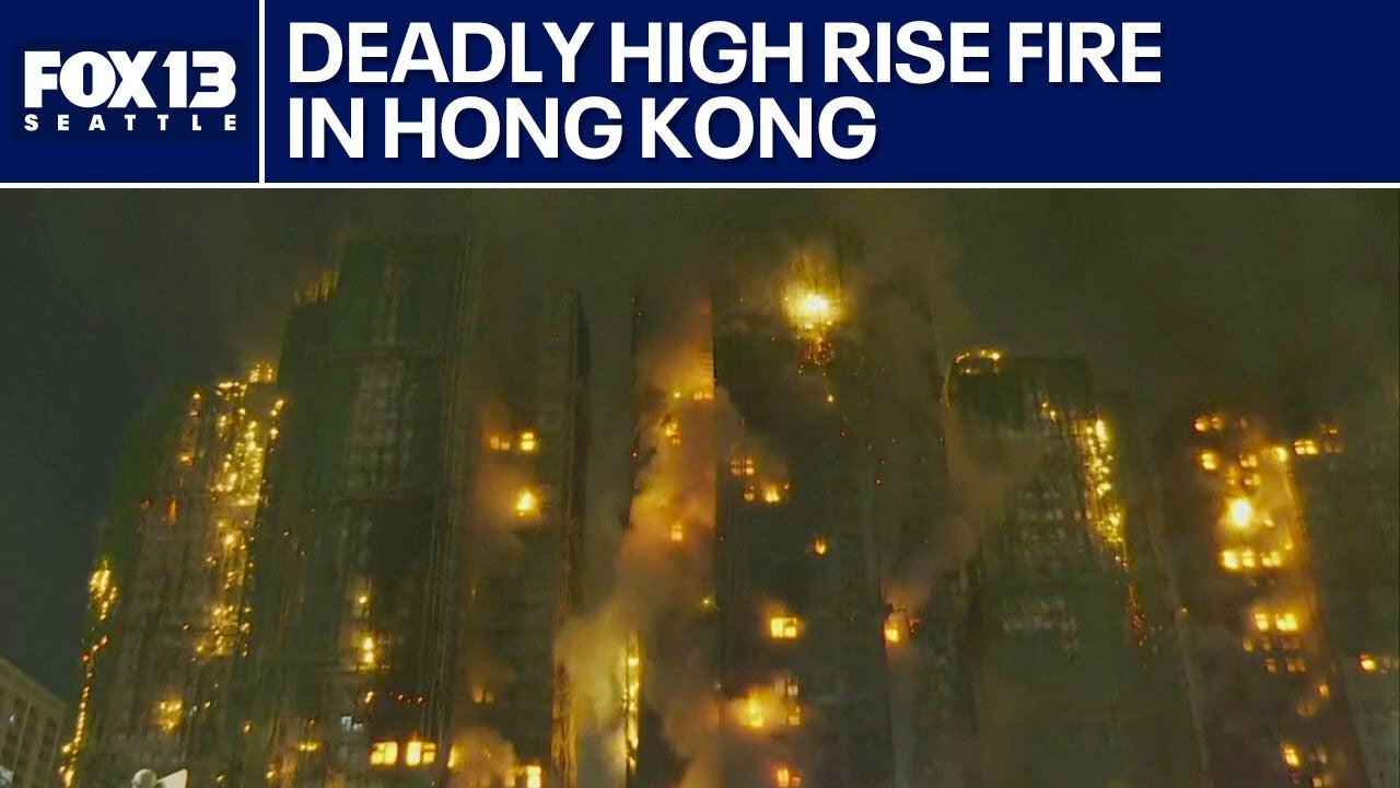 13 people killed in fire engulfing Hong Kong high-rise - YouTube