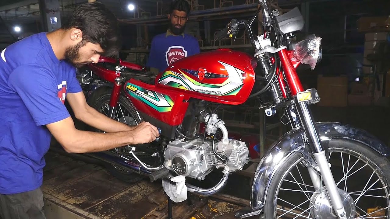 Making a 70cc Bike: A Journey Through The Factory - YouTube