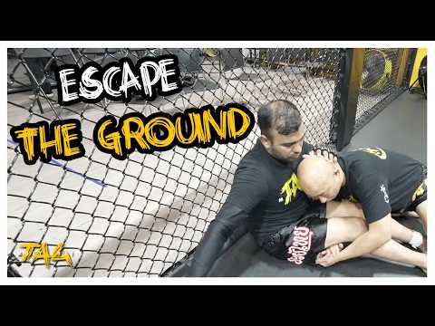 How to Get Back to Your Feet in a Fight | Muay Thai & MMA