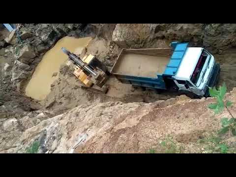 Slush removal by using of Excavator and Hywa - YouTube