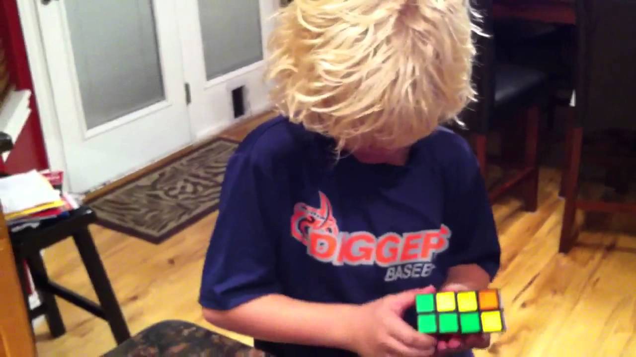 9 year old solves a 2x2x4 shapeshifter Rubik's cube in 2min - YouTube