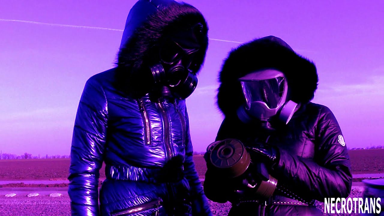 Modern gas masks and ski overalls. Formation of the fashion of ...