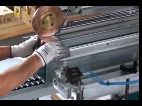 Longitudinal seam welder for square ducts with motorized tube support ...