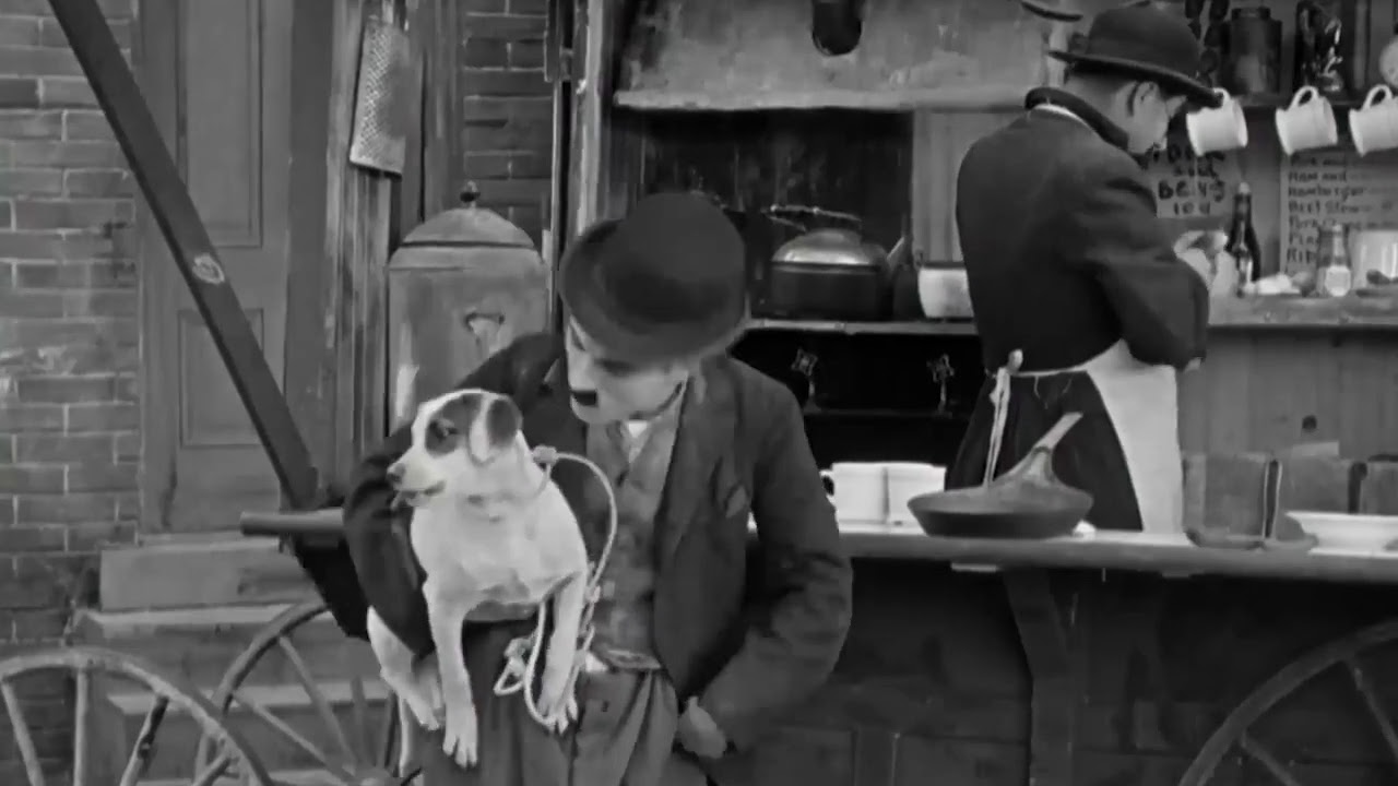 Charlie chaplin keeps stealing the bread without letting the owner know ...