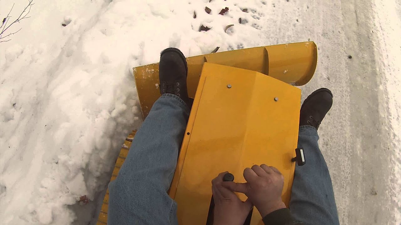Struck mini dozer pushing snow - YouTube