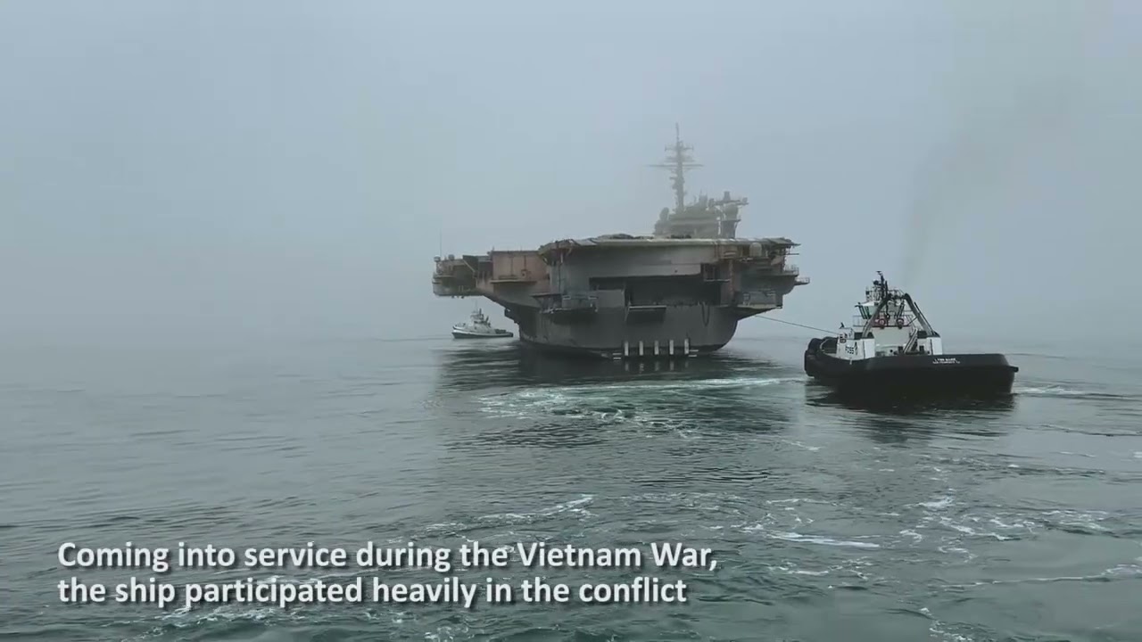 USS Kitty Hawk aircraft carrier sails for the scrapyard - YouTube