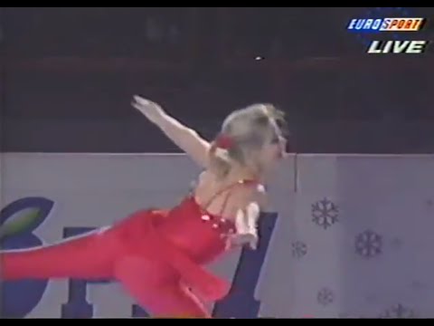 Beautiful blonde ice skater in slow motion