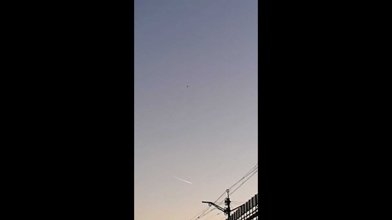 mysterious black object in the sky - YouTube