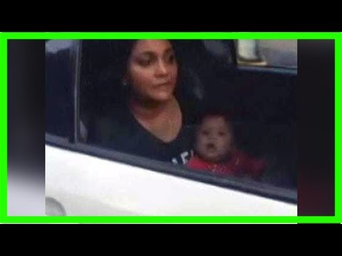 Mumbai police tow car with woman breastfeeding her baby still inside