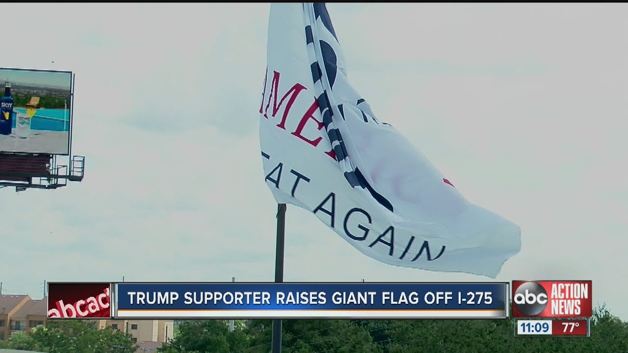 Trump supporters raises giant flag off I-275 - YouTube