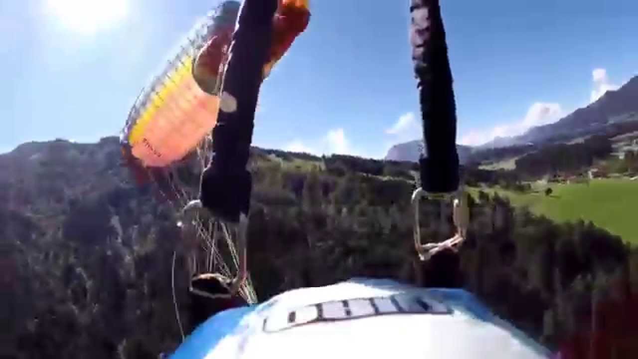 Paraglider crash lands in river - terrifying parachute fail - YouTube