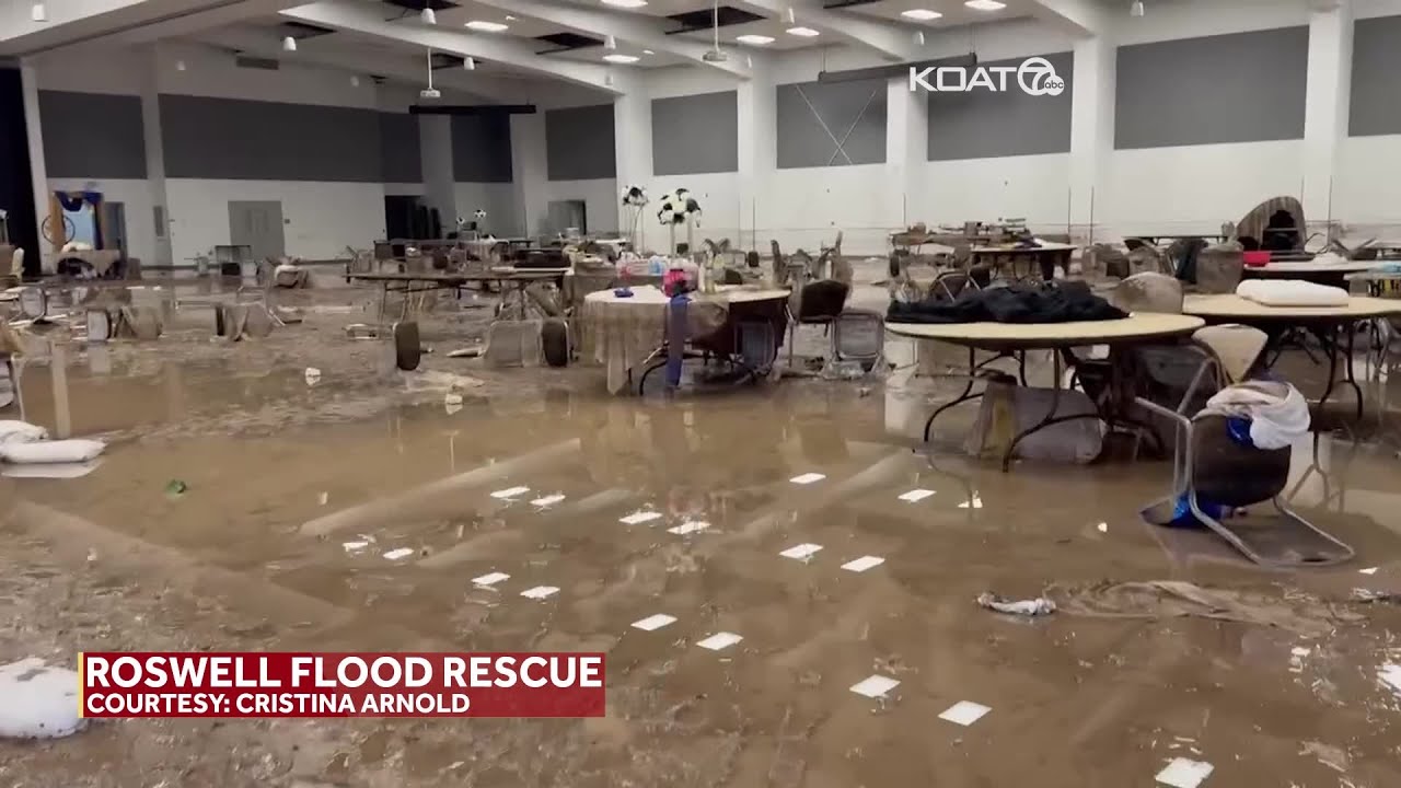 Caught on Camera: Dramatic rooftop rescue from flooding in Roswell ...