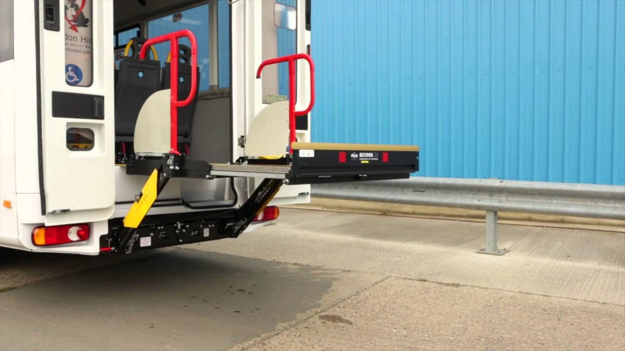 16 seater coach built treka tail lift - YouTube