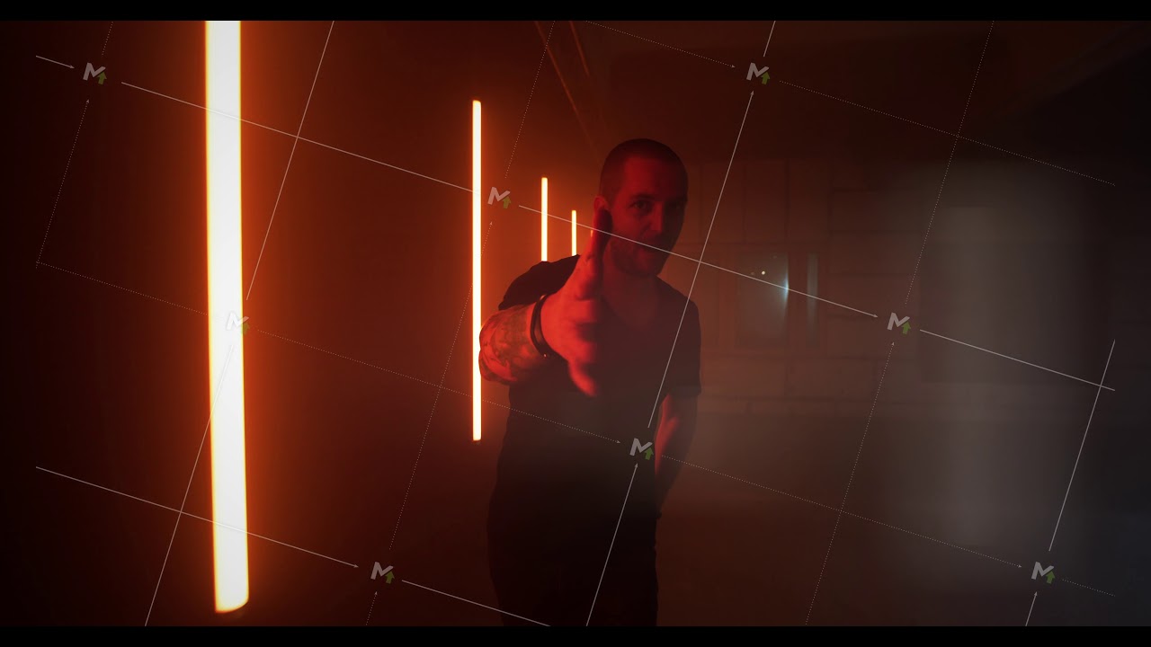 Male rapper walking near red lamps - YouTube