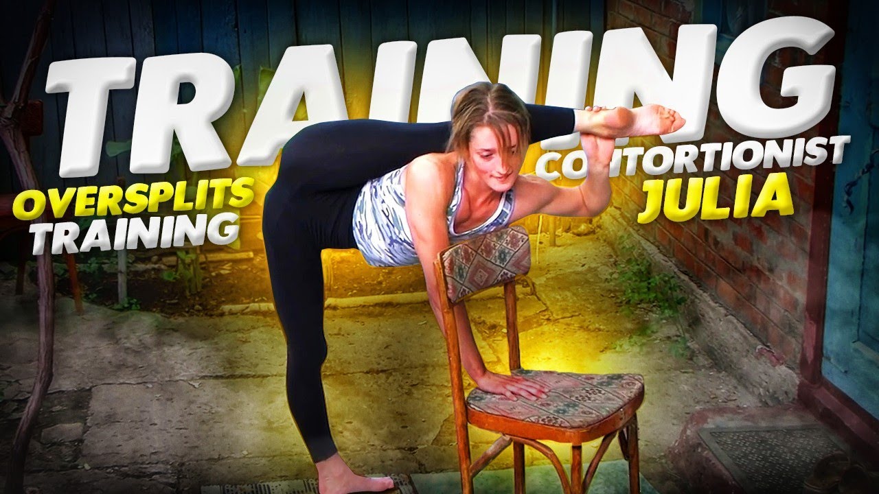 Oversplits stretching. Contortionist Julia doing gymnastics training ...