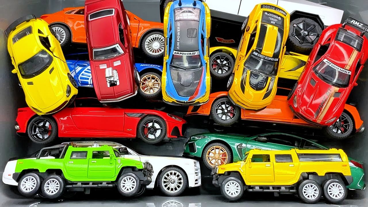 Box full of various miniature cars Peugeot, Volvo, Renault, Hyundai ...