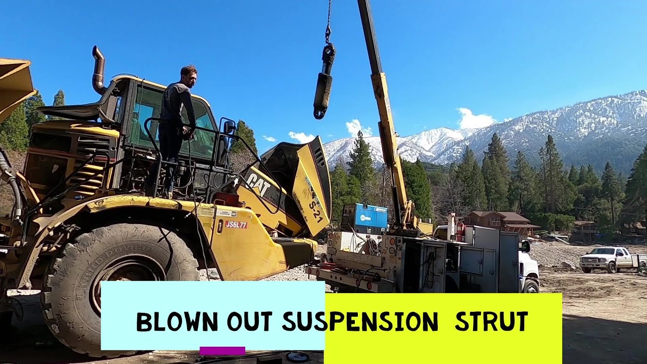 Cat 735 Suspension Strut Removal and Hurricane Flood Damage - YouTube