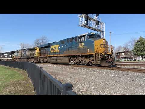 CSX & Norfolk Southern 3 engine (Locomotive) lashup going through Fostoria, Ohio on March 29 ...