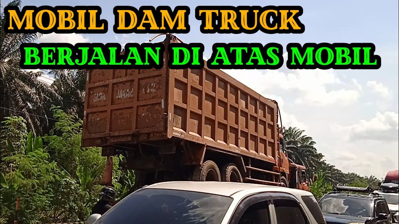 MOBIL DAM TRUCK BERJALAN DI ATAS MOBIL - YouTube