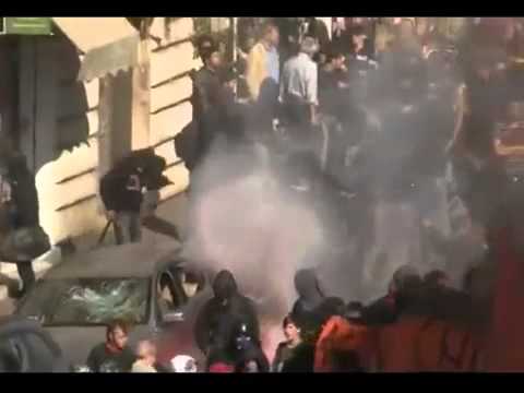 Riot police fire tear Gas at protesters in Rome - YouTube