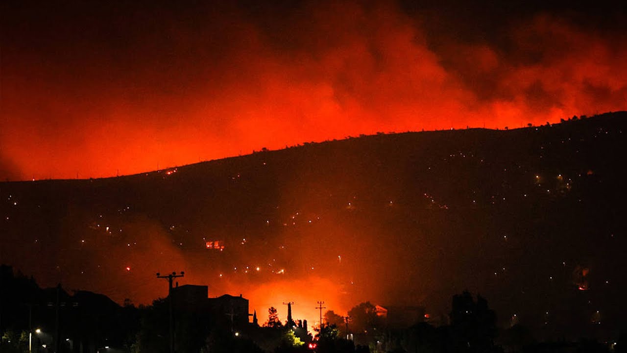 Hundreds evacuated as wildfire spreads near Athens - YouTube