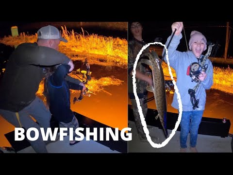 Bowfishing in the Everglades. My girls kill their first fish.