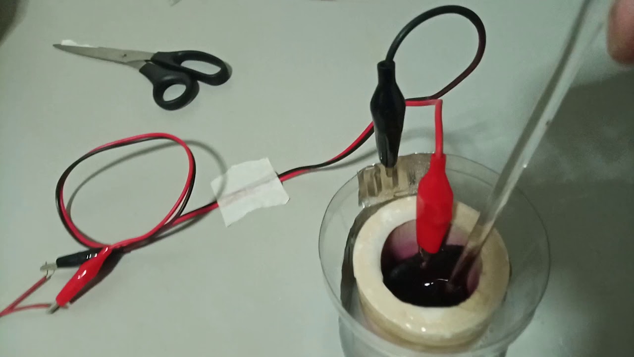 Battery using ion conducting ceramic separator and dual electrolyte ...