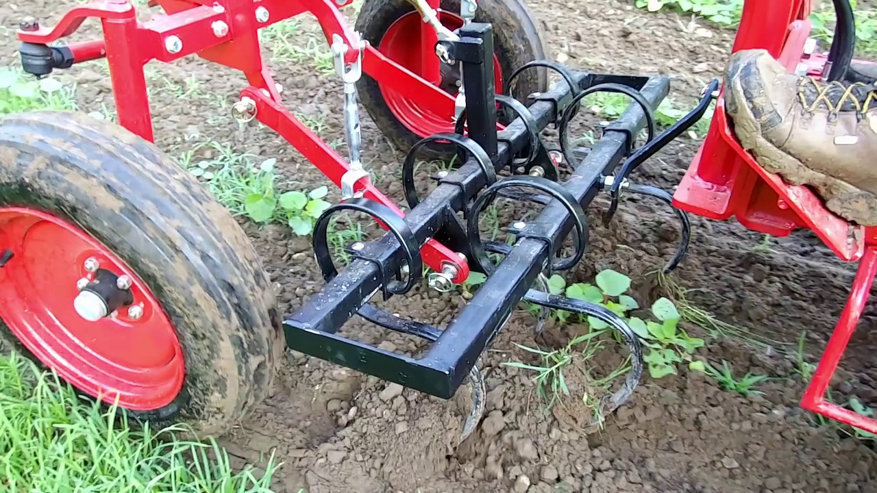 Oggún Tractor through the garden season (novice operator) - YouTube