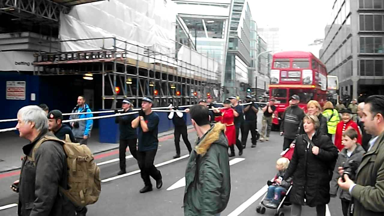 Volunteer bus pull charity - YouTube