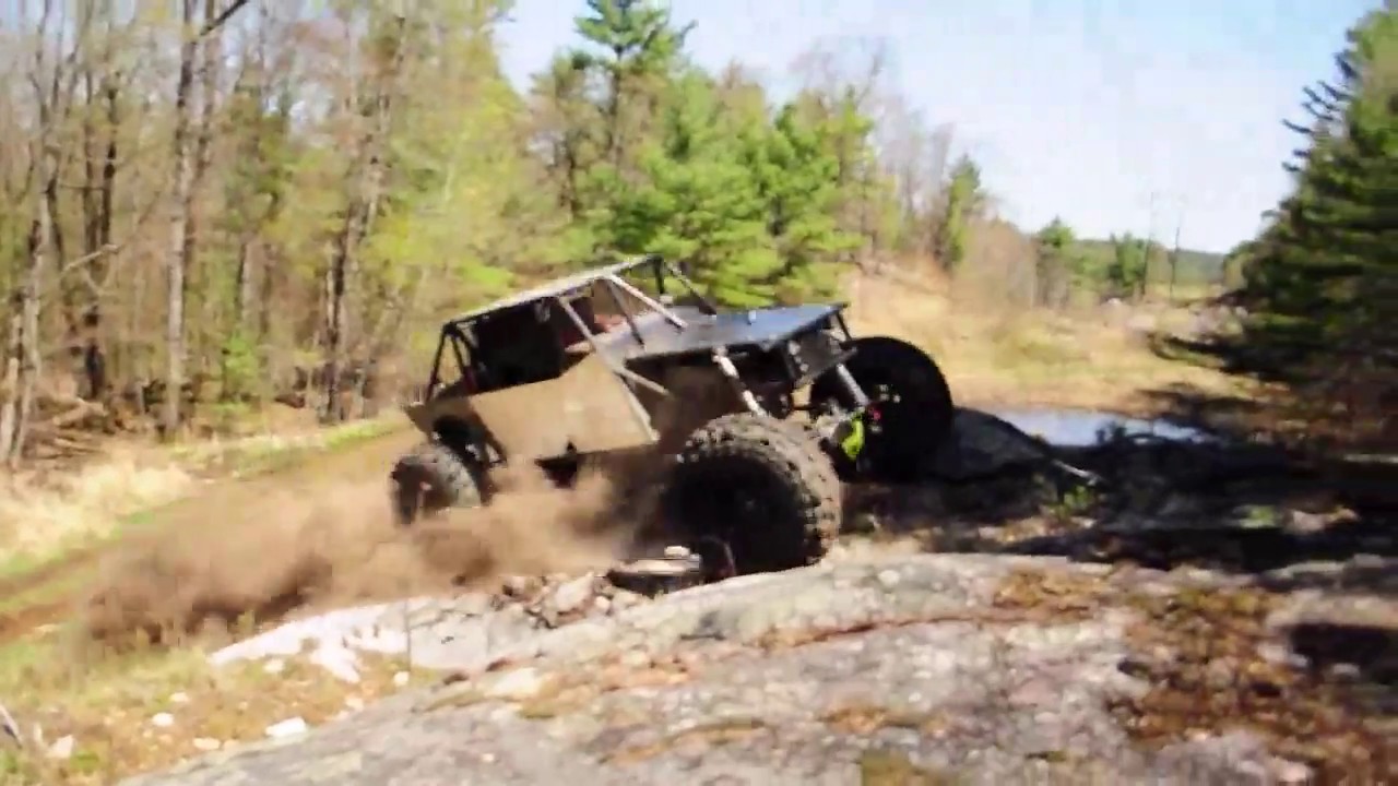 Custom TMR race chasis buggy destroying the rocks - YouTube
