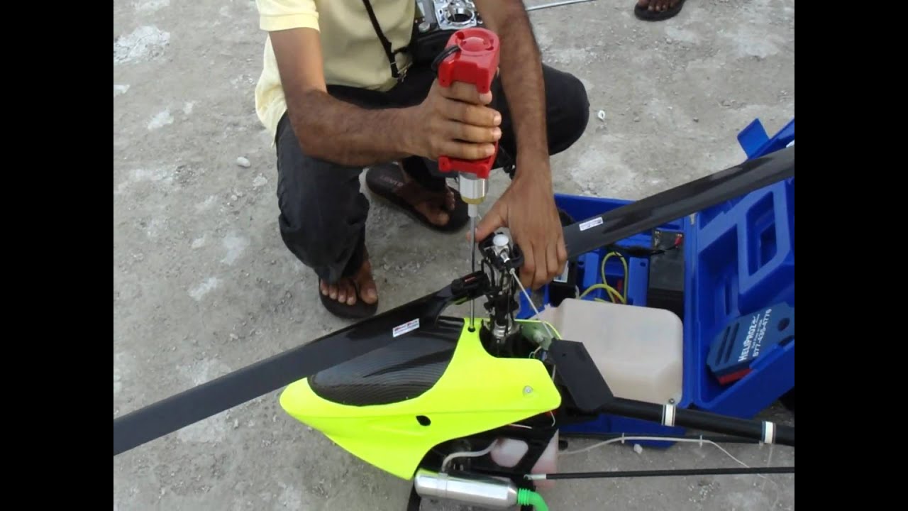 Flying Raptor 50 RC Helicopter.wmv - YouTube