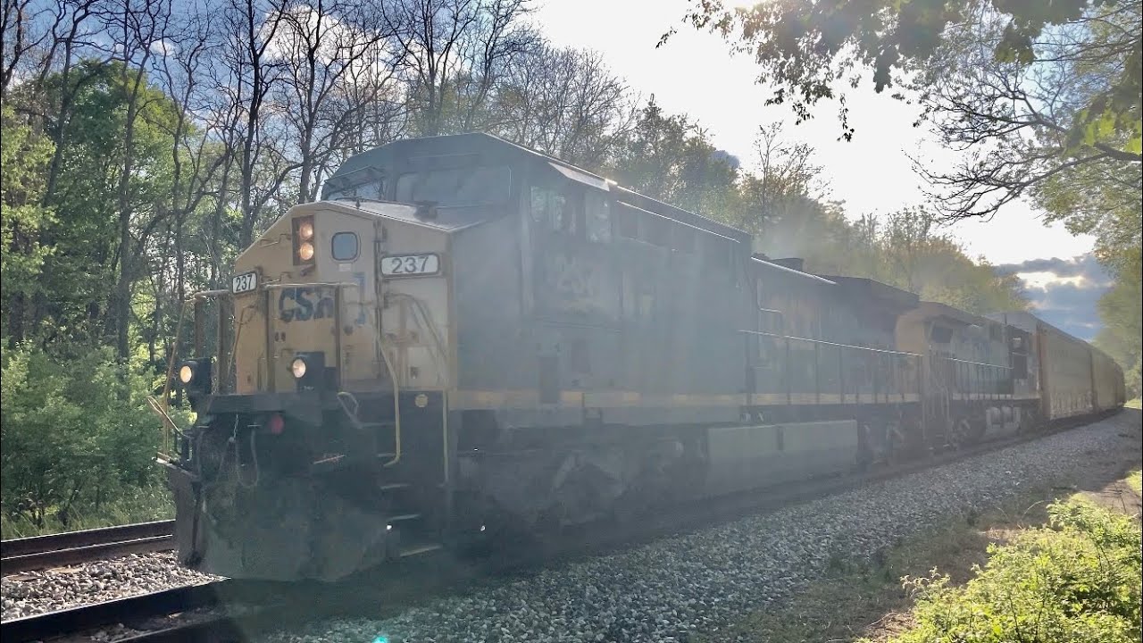 CSX 237 leads Q332 through Munroe Falls Ohio - YouTube