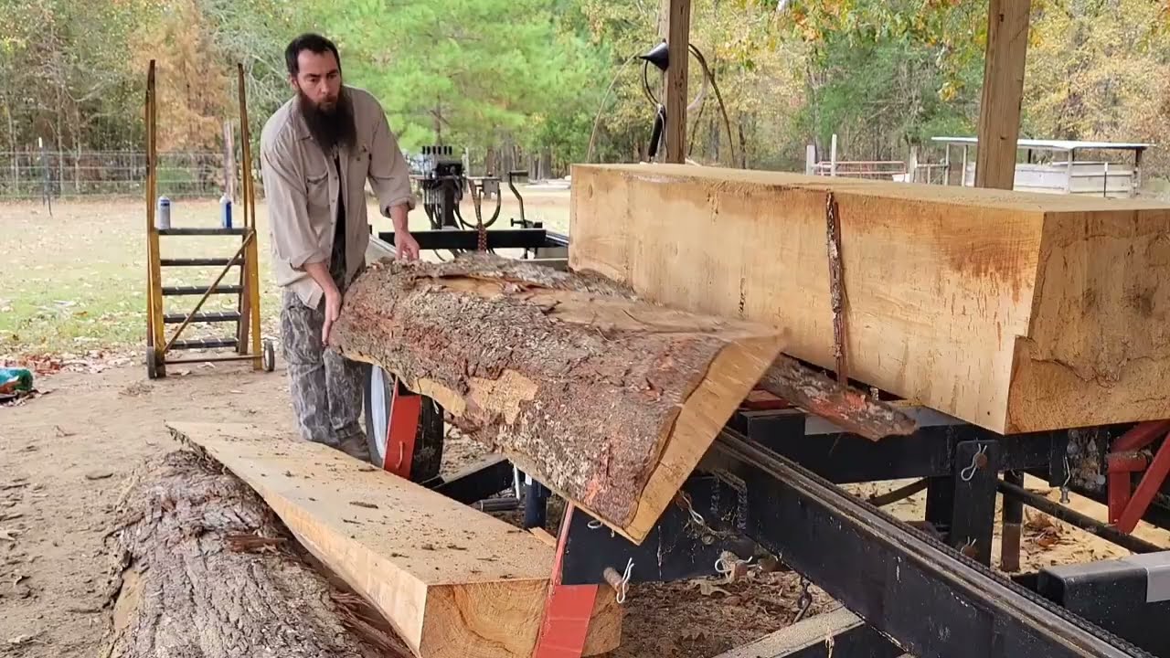 Sawing Cypress 1×12's on the TimberKing 1600 - YouTube