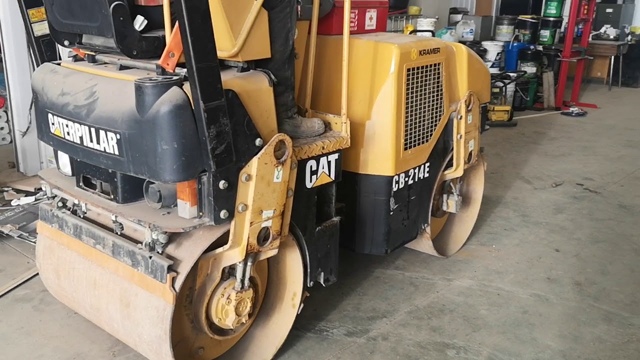 CAT CB-214E Vibratory Smooth Drum Roller - YouTube