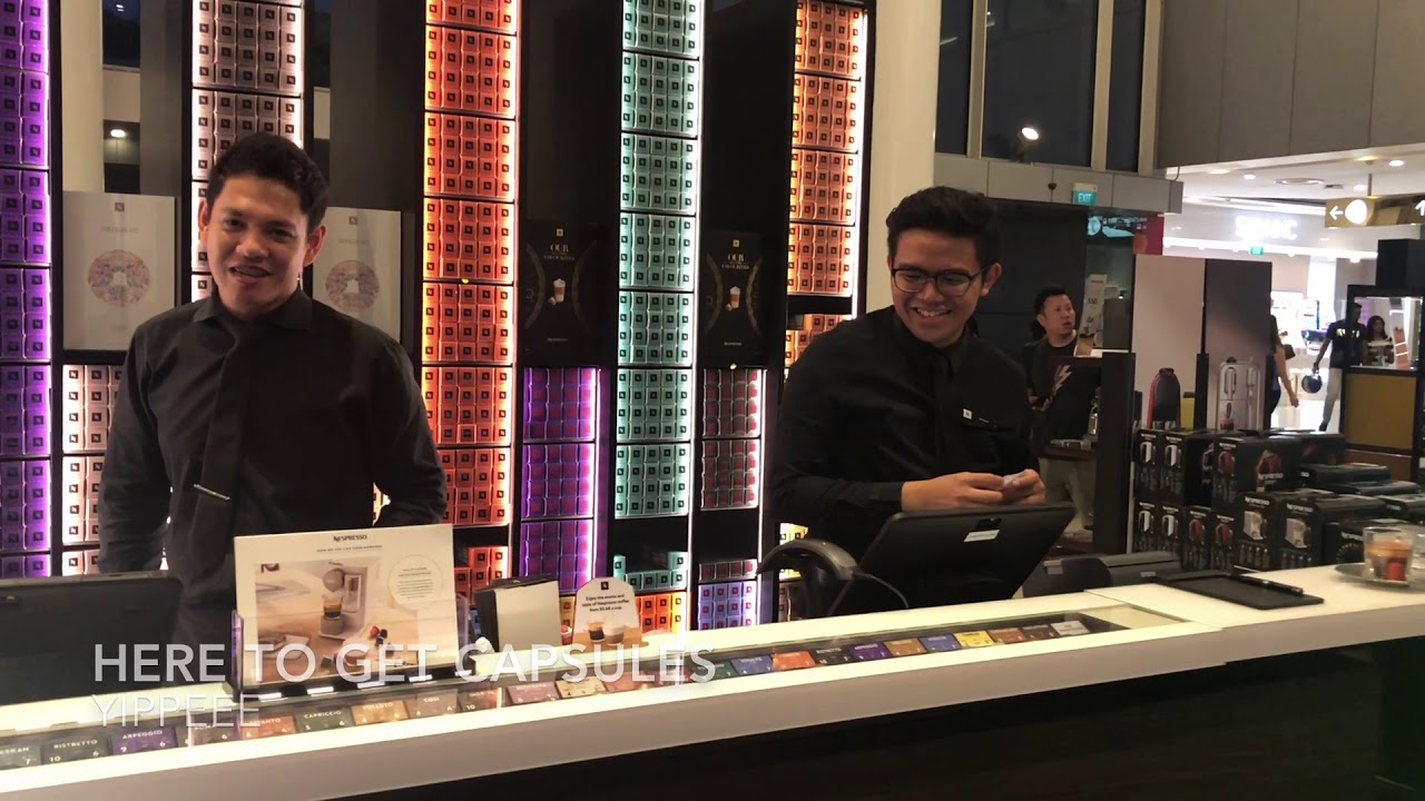 Nespresso Pop Up Store VivoCity Singapore Coffee Sleeves and Red Pixie ...