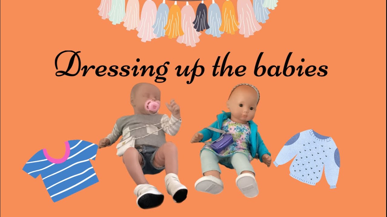 Dressing up the babies - YouTube