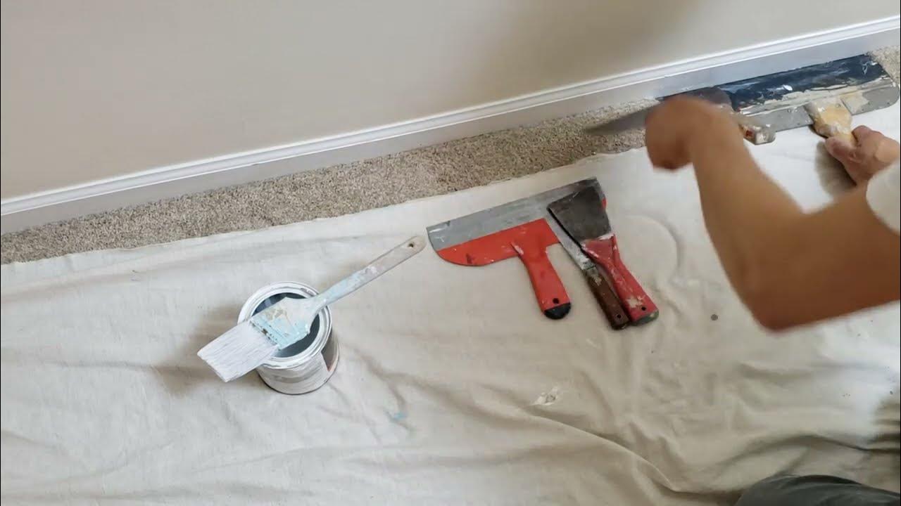 Lifehack: How to paint baseboard trim without painting the carpet - YouTube